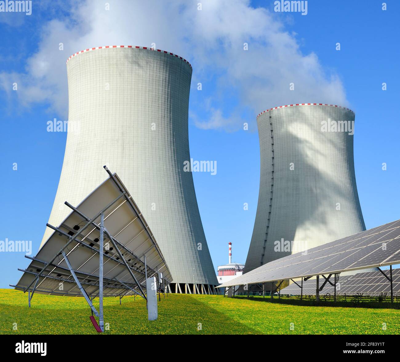 Solar panels and nuclear power plant. Energy resources concept Stock ...