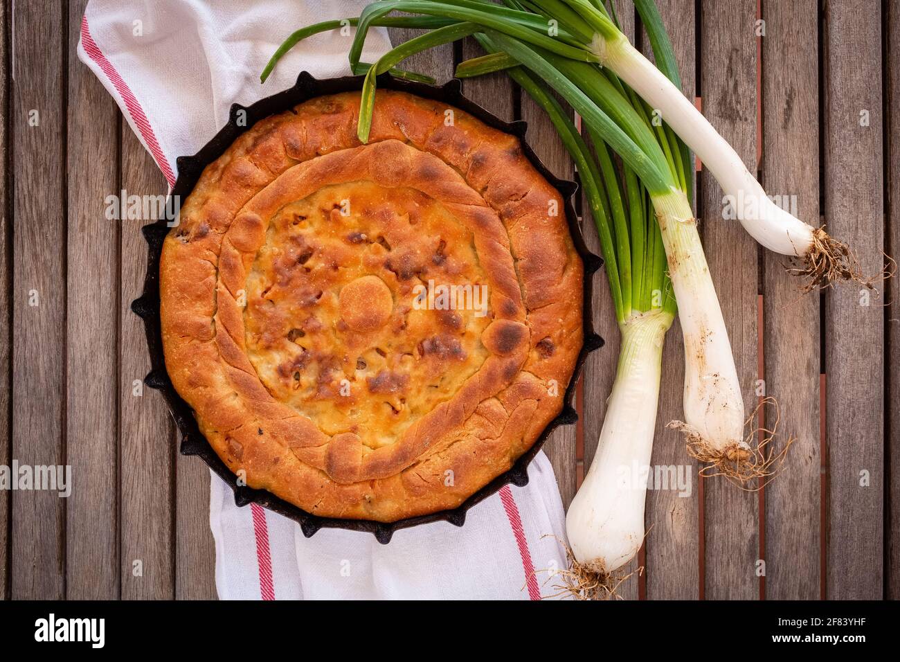 Pizza calzone filled with onion and tuna - Food of Puglia Stock Photo ...
