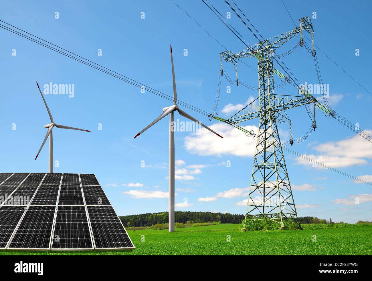 Solar panel with wind turbines and electricity pylon on meadow. Concept ...