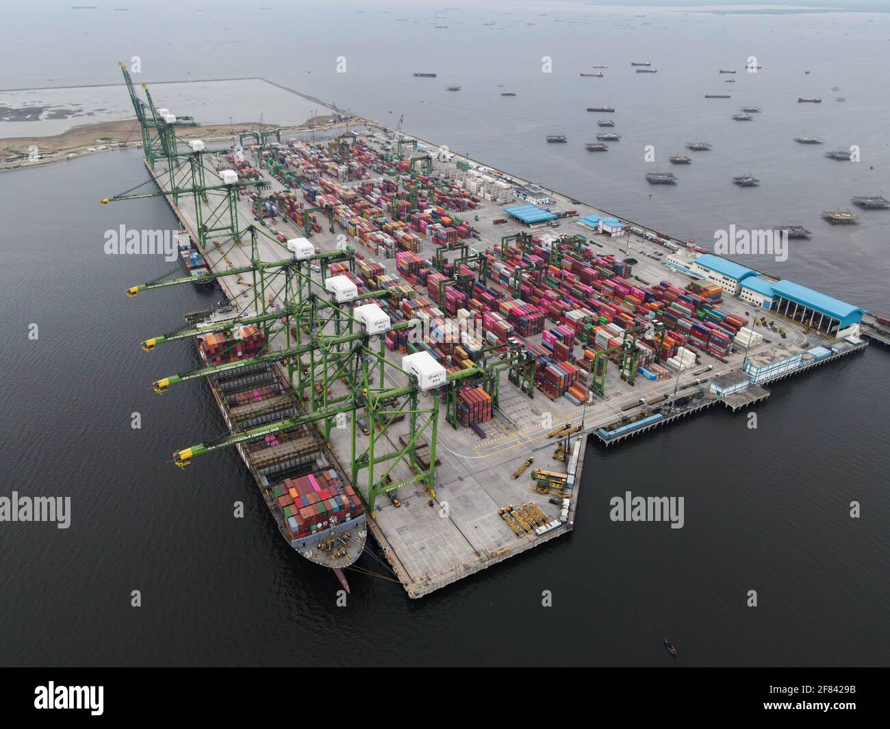 Aerial view of Container ship loading and unloading in deep sea port ...