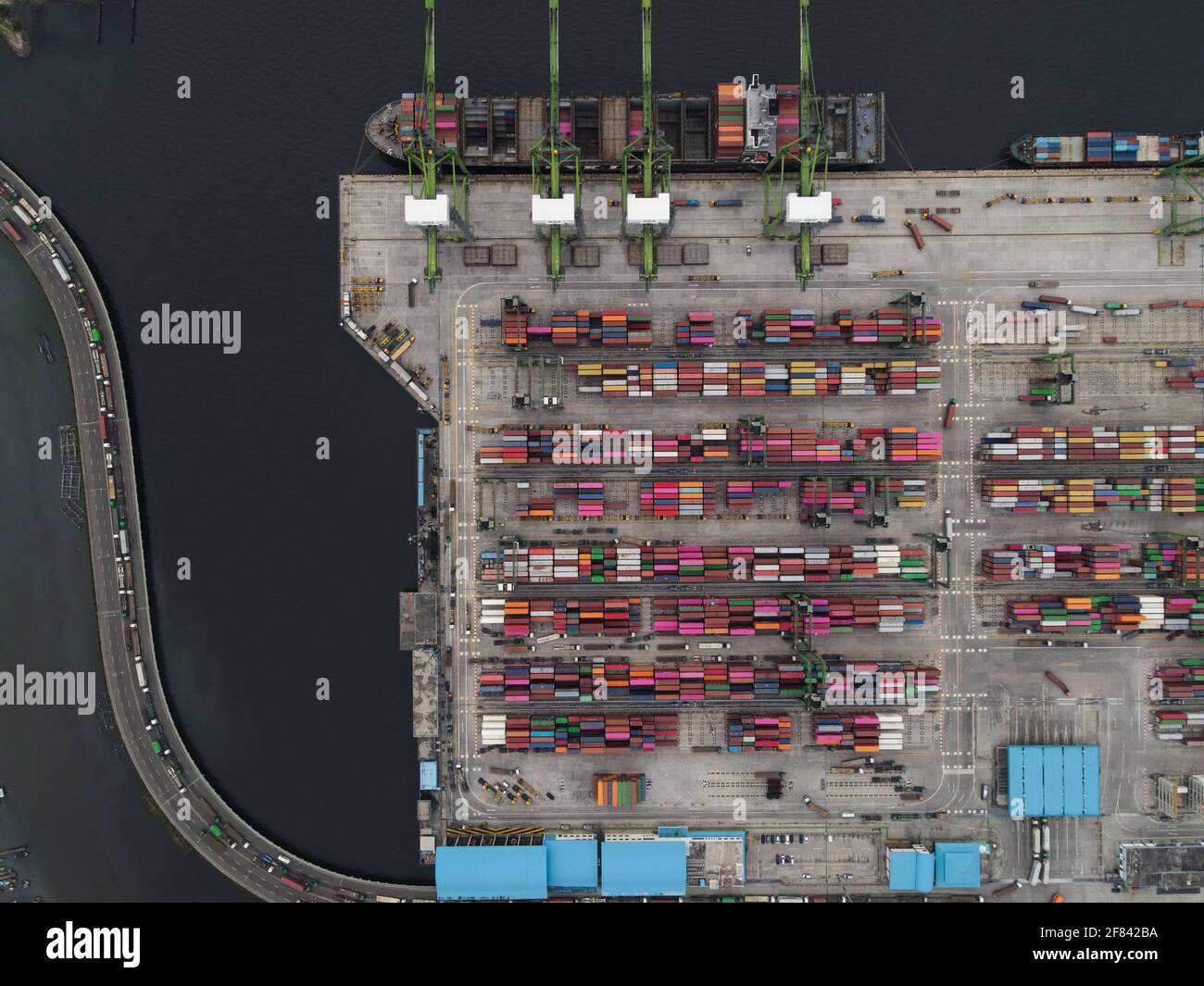 Aerial view of Container ship loading and unloading in deep sea port ...