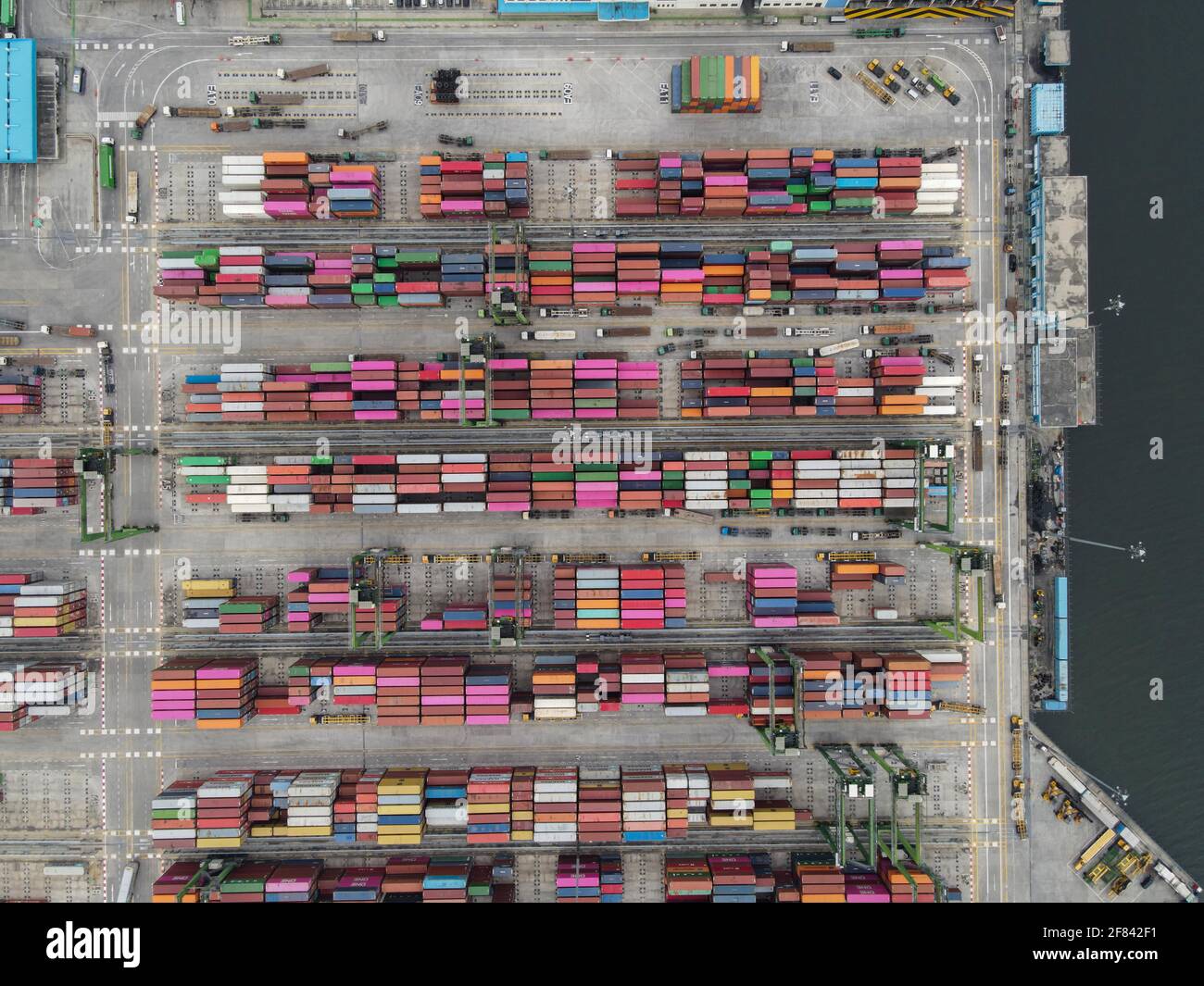 Aerial view of Container ship loading and unloading in deep sea port, import and export freight ...