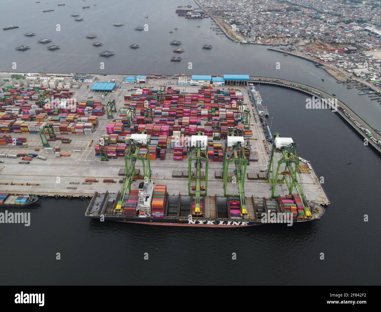 Aerial view of Container ship loading and unloading in deep sea port ...