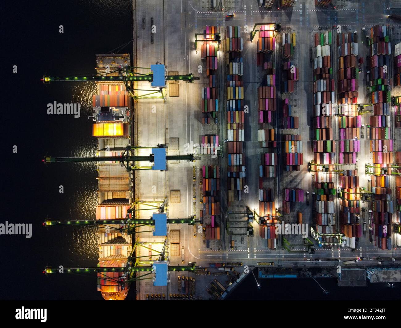 Aerial view of Container ship loading and unloading in deep sea port ...
