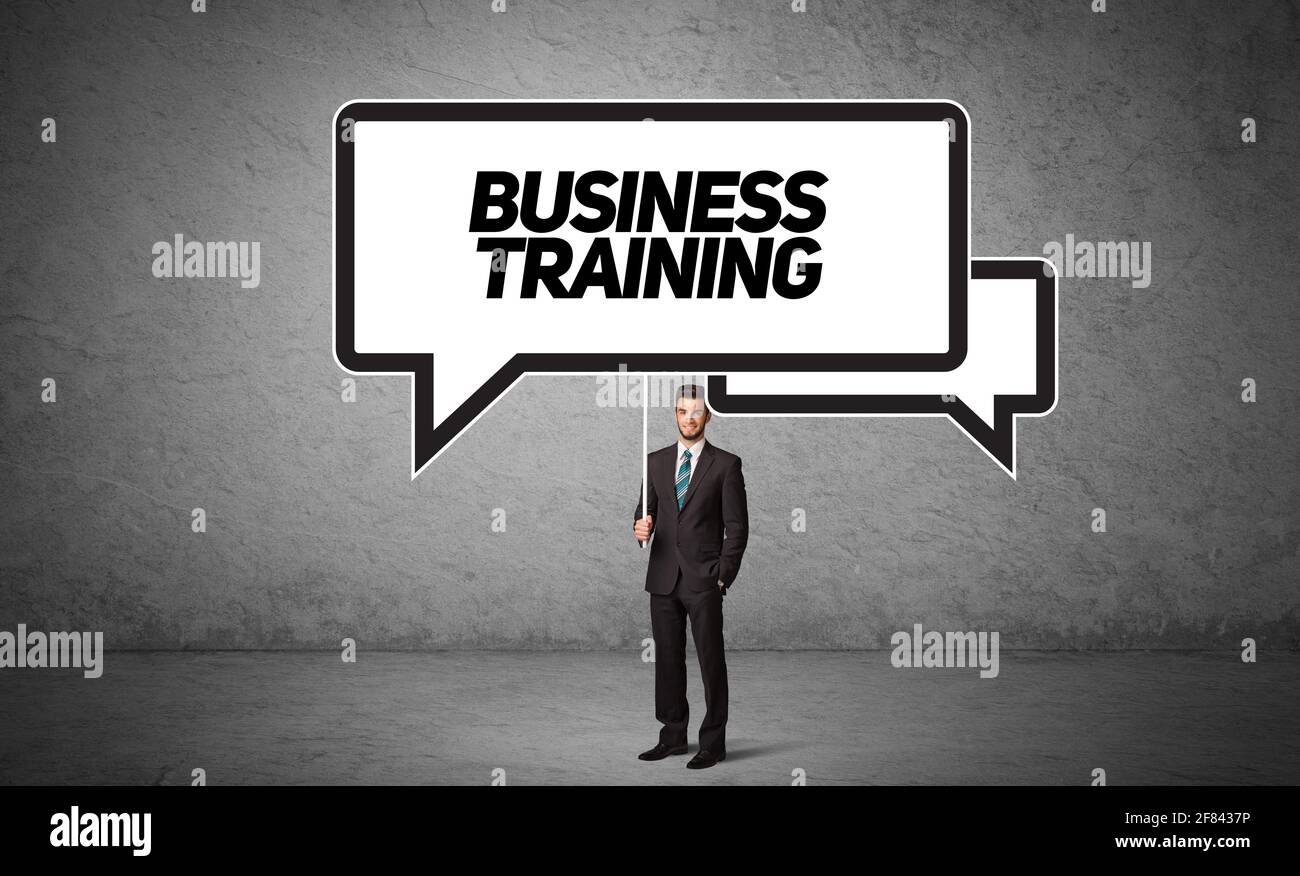 business person in casual holding road sign Stock Photo - Alamy