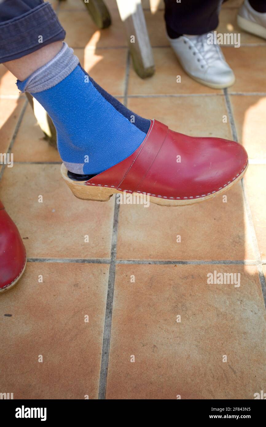 Swedish red leather clogs Stock Photo - Alamy