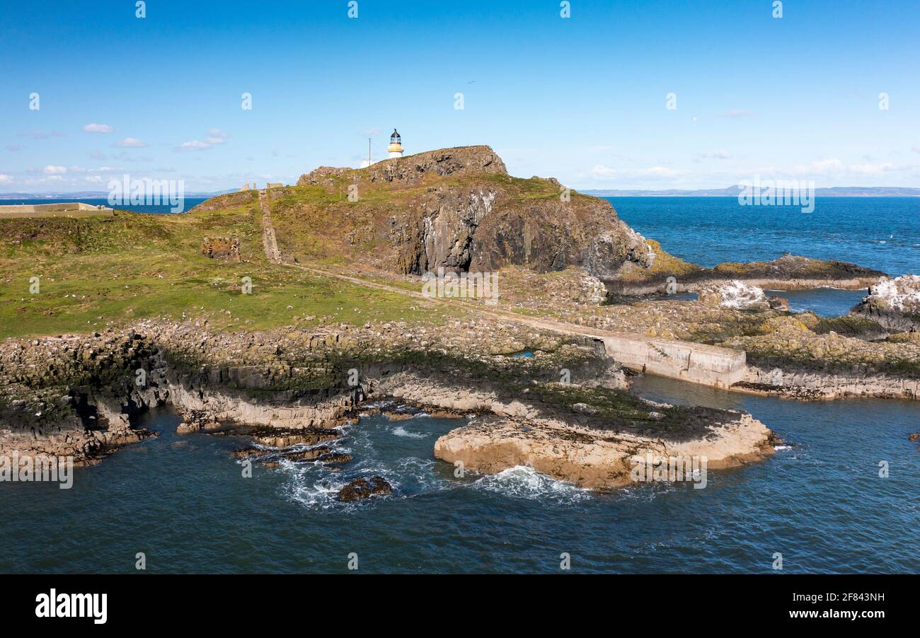 Aerial view from drone of Fidra Island and lighthouse in Firth of Forth ...