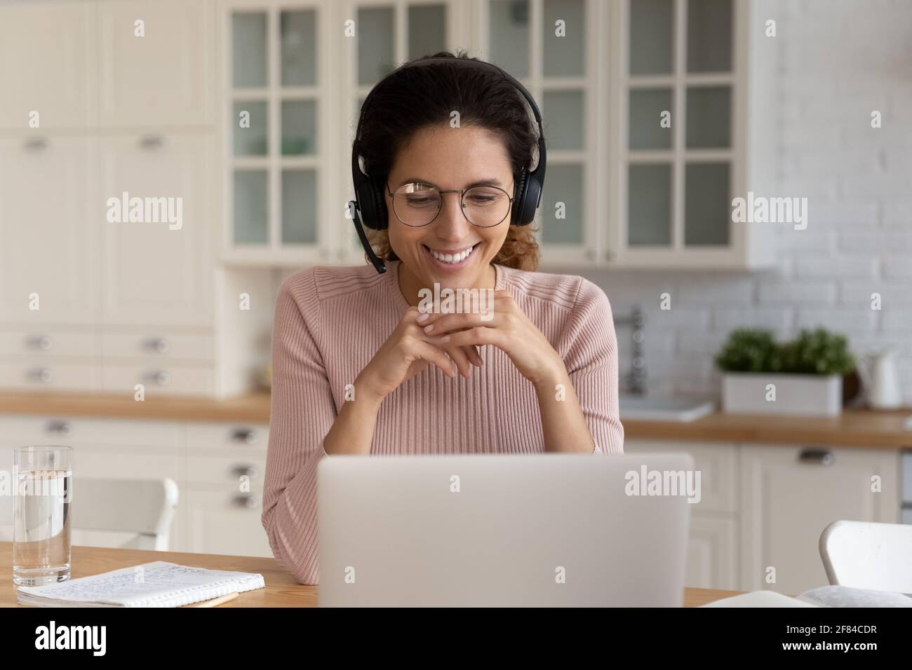 Hispanic lady customer support manager wear headphones help client ...