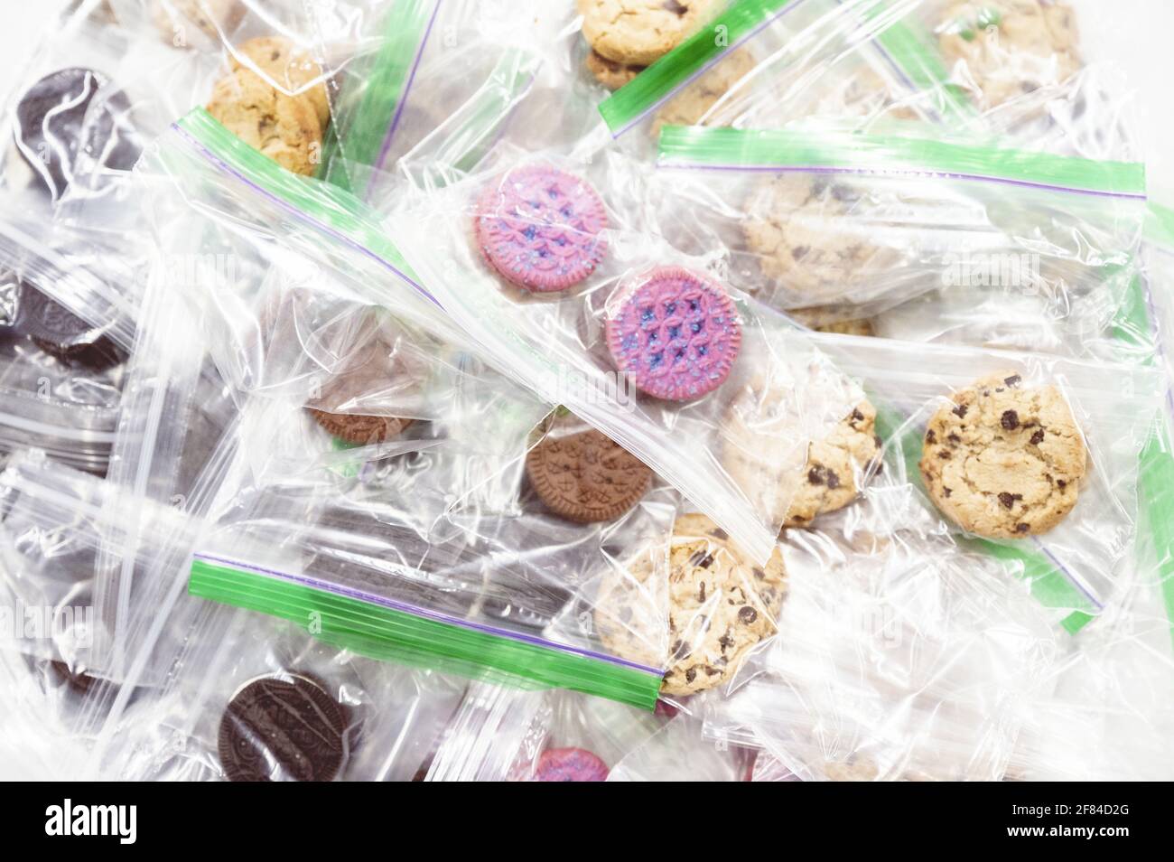 A top view of different types of cookies in plastic bags Stock Photo ...