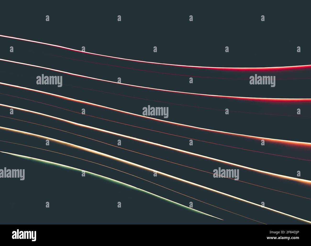 The wavy led lights lines on a dark background Stock Photo - Alamy