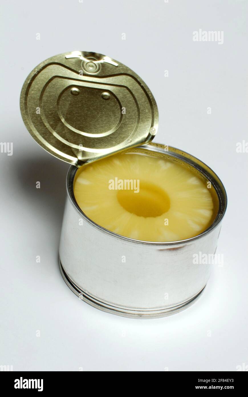 Pineappleslices (Ananas comosus) in tin can, canned fruit, canned food ...