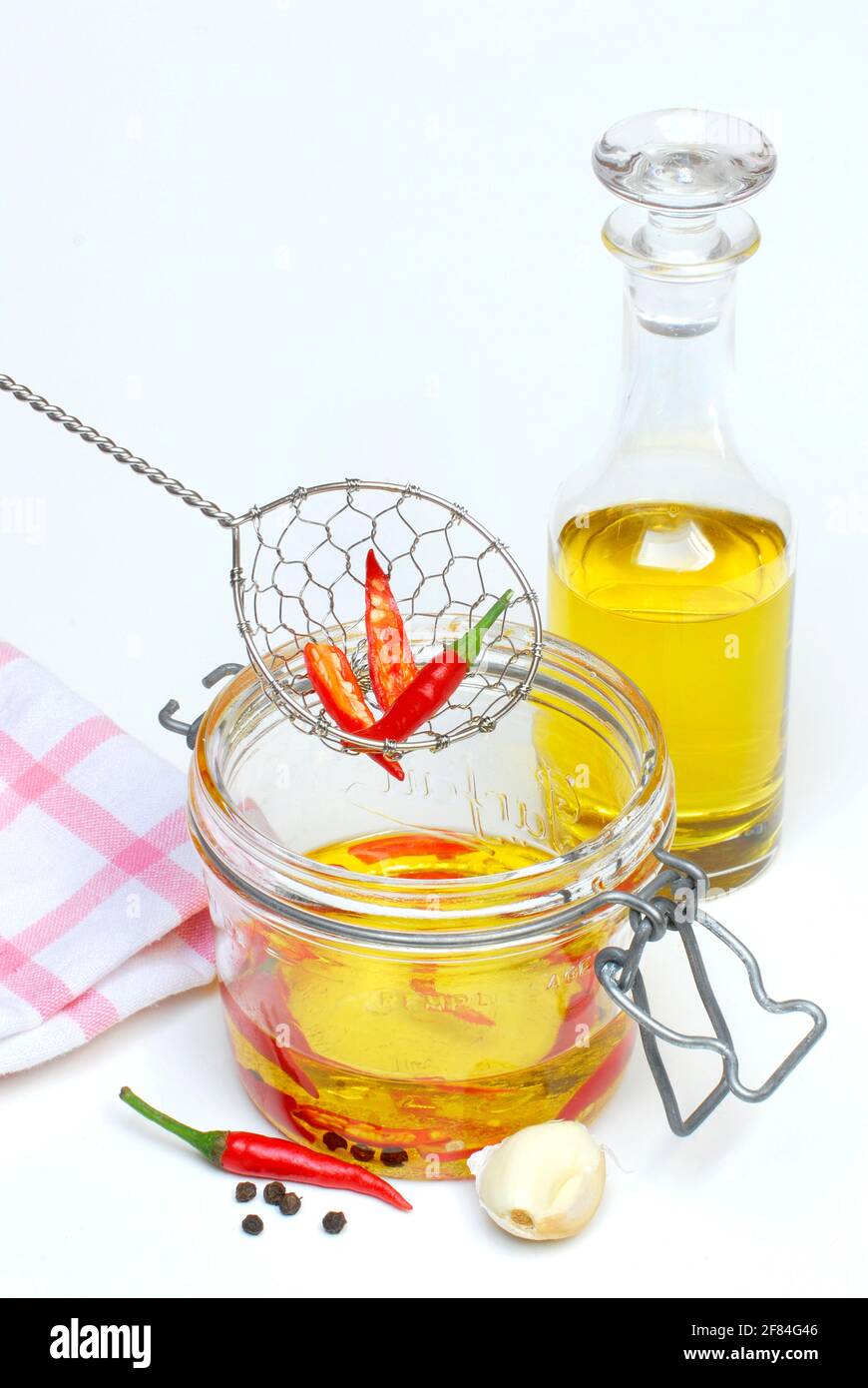 Preparation of chili oil, ingredients oil, chillies, garlic ...