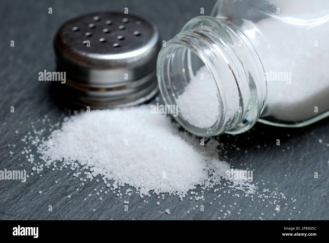 Salt shaker with table salt, table salt, salt, sodium chloride Stock ...