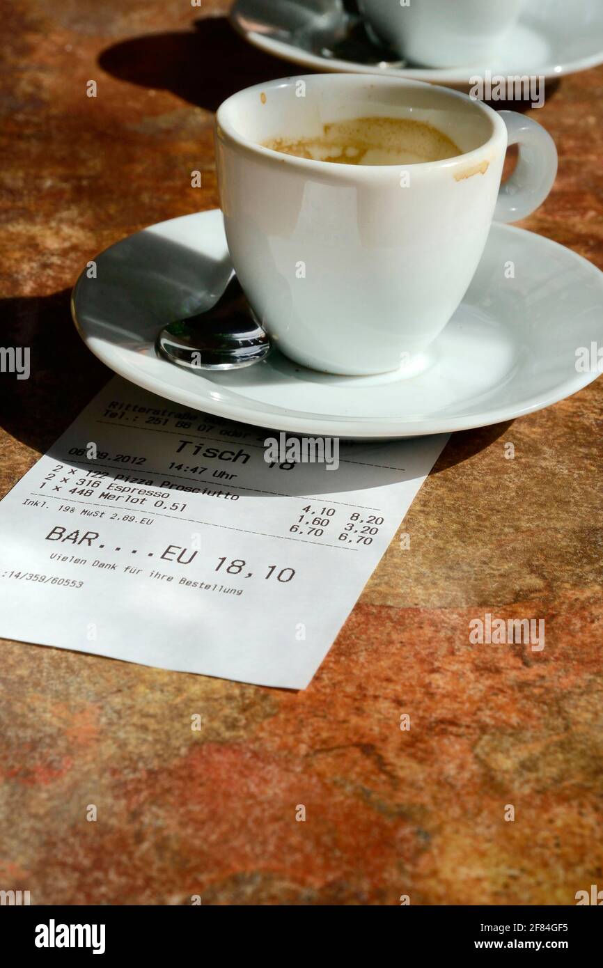 Empty cup of espresso and receipt, espresso cup, receipt, coffee ...