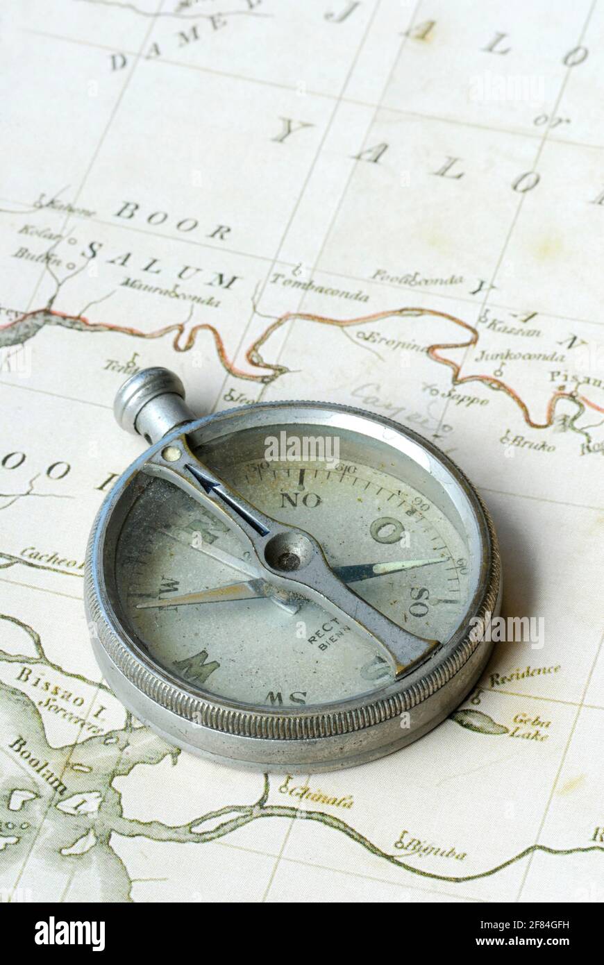 Old compass on map, orientation, discovery, explorer Stock Photo - Alamy
