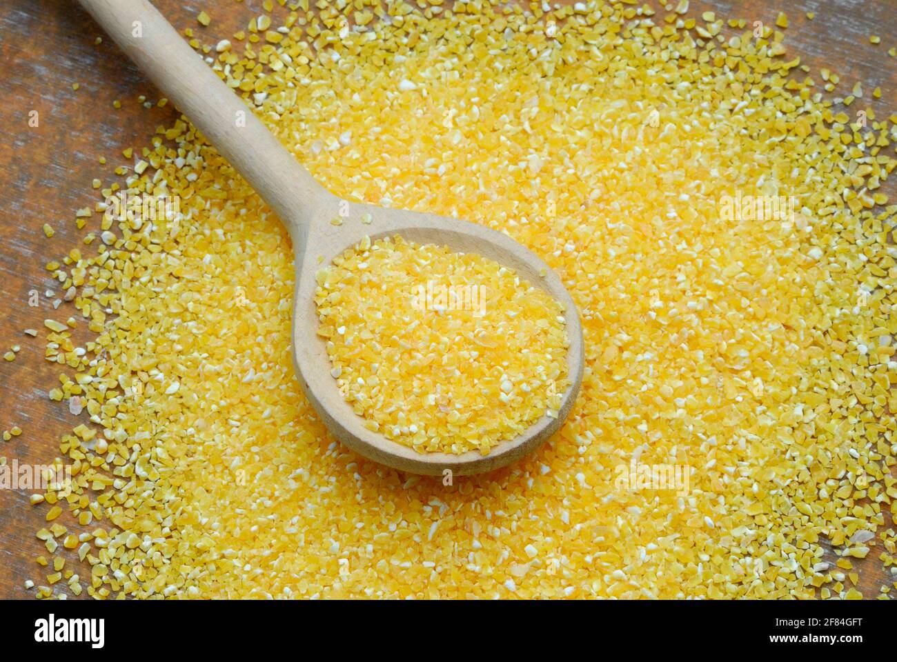 Polenta, maize, corn semolina, maize meal, corn flour, wooden spoon ...