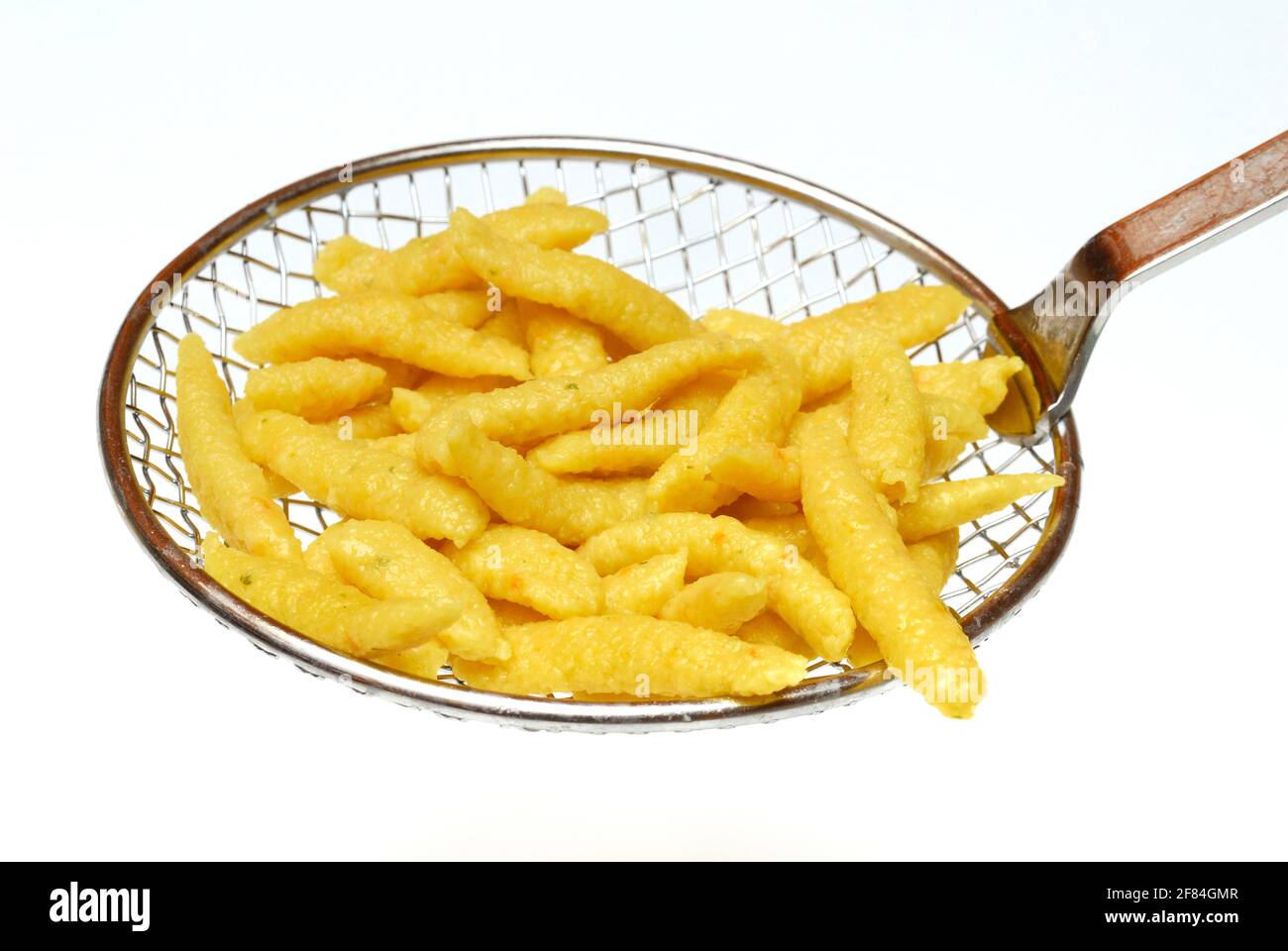 Spaetzle in skimmer, spaetzle, noodles Stock Photo - Alamy