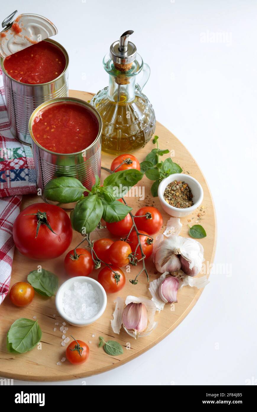 Italian tomato sauce. Ingredients for cooking tomato sauce on white ...