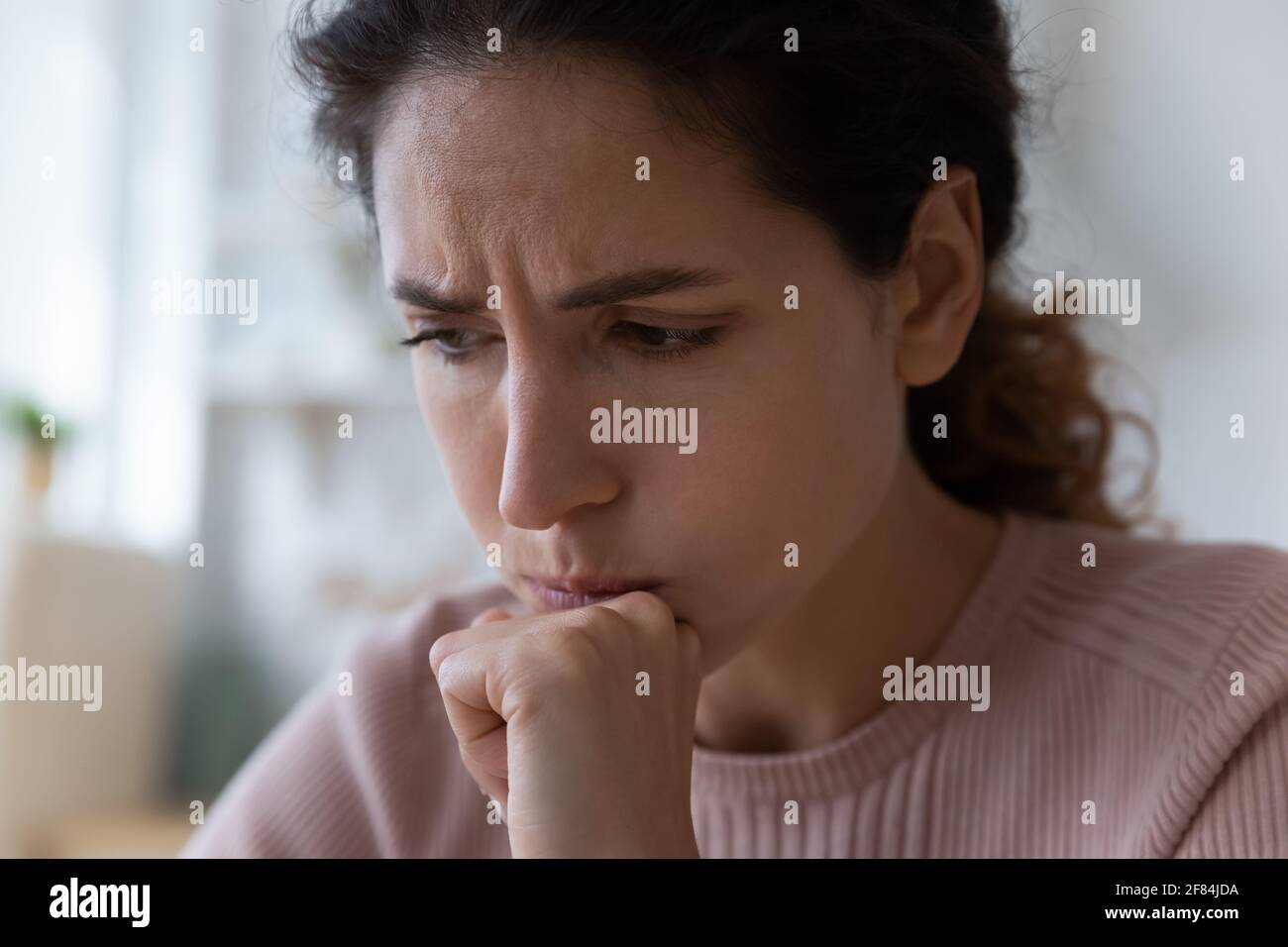 Woman confused unhappy choice hi-res stock photography and images - Alamy