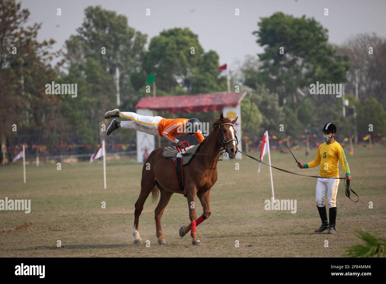 A Nepalese soldier performs horse riding skills during the "Ghodejatra ...