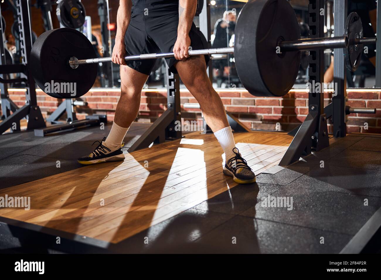 Athlete straining lifting weights hi-res stock photography and images ...