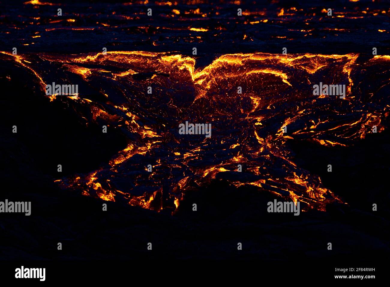 Liquid gold - lava river at night, Fagradalsfjall volcano, Iceland ...