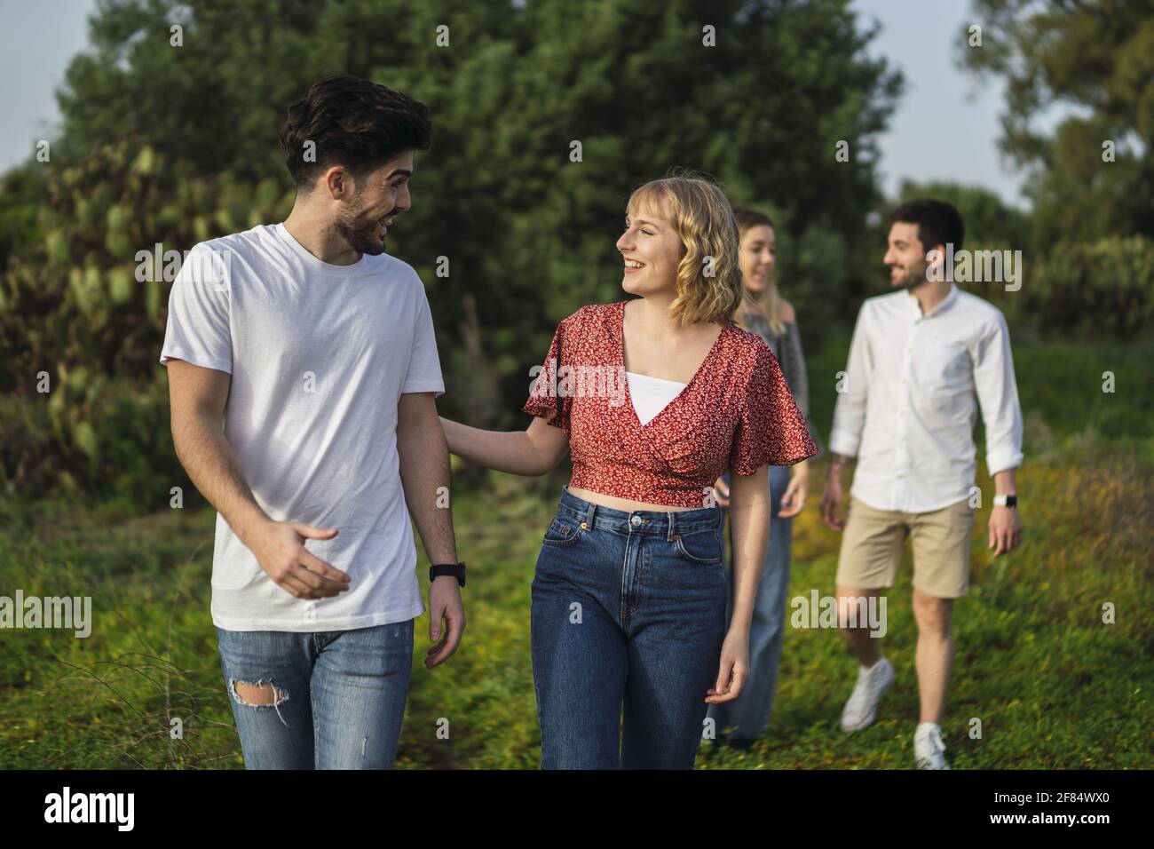 A shallow focus shot of Spanish Caucasian young friends hanging out in ...