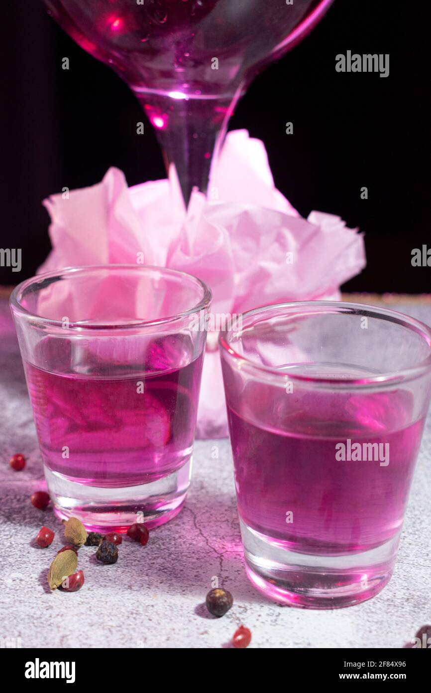 pink alcoholic drink in glass shot glasses Stock Photo - Alamy