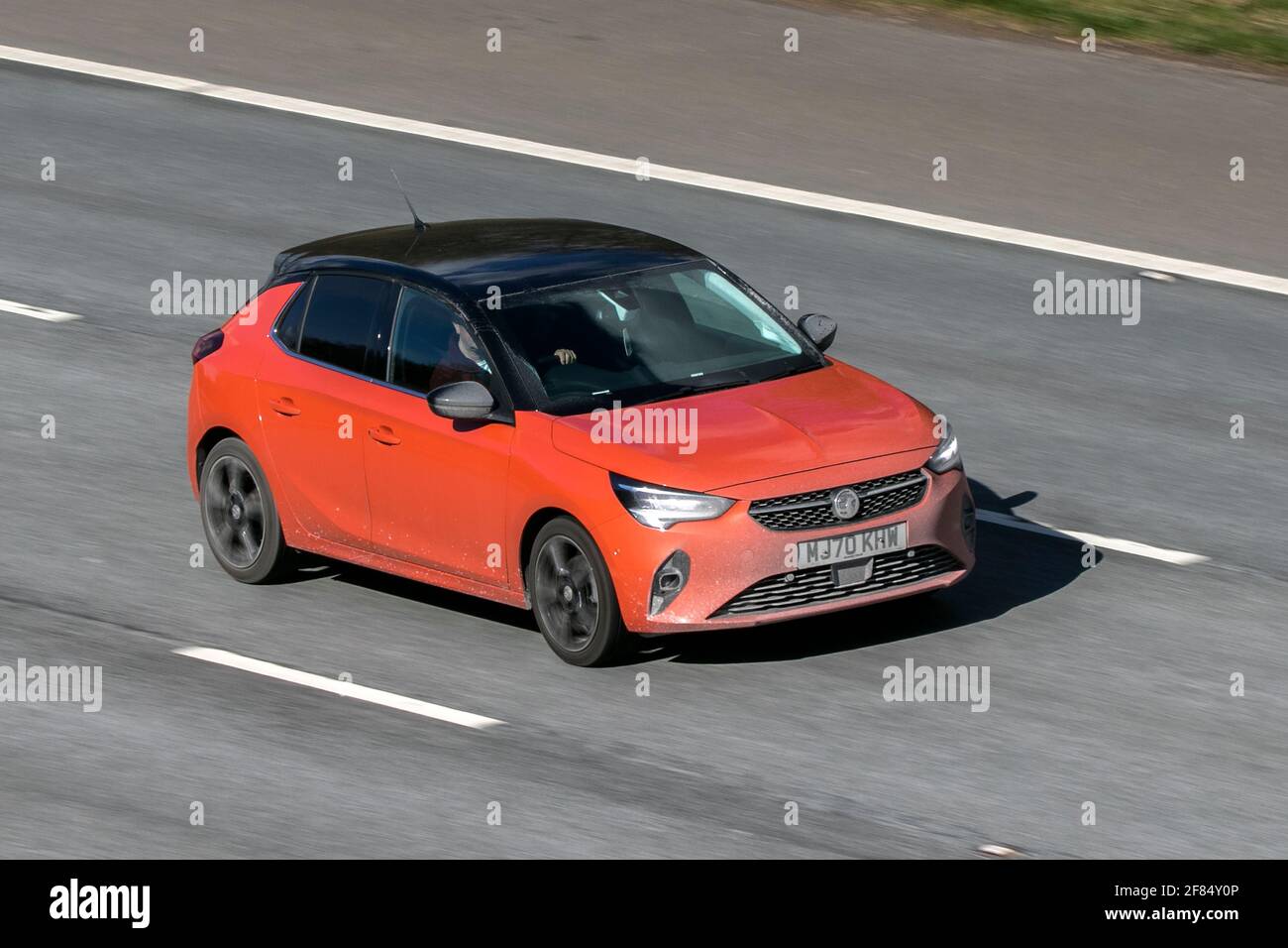 Vauxhall corsa elite nav premium orange cars hi-res stock photography ...