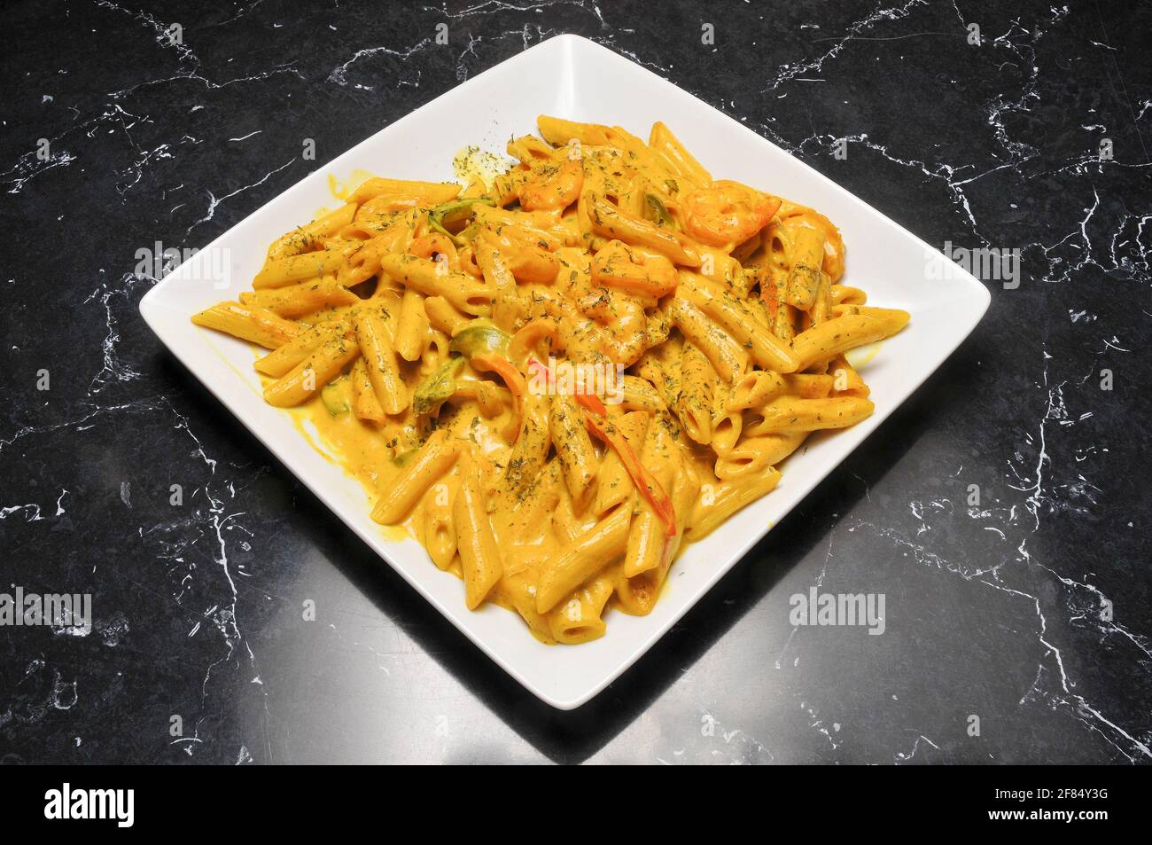 Delicious traditional cuisine known as curry shrimp pasta Stock Photo ...