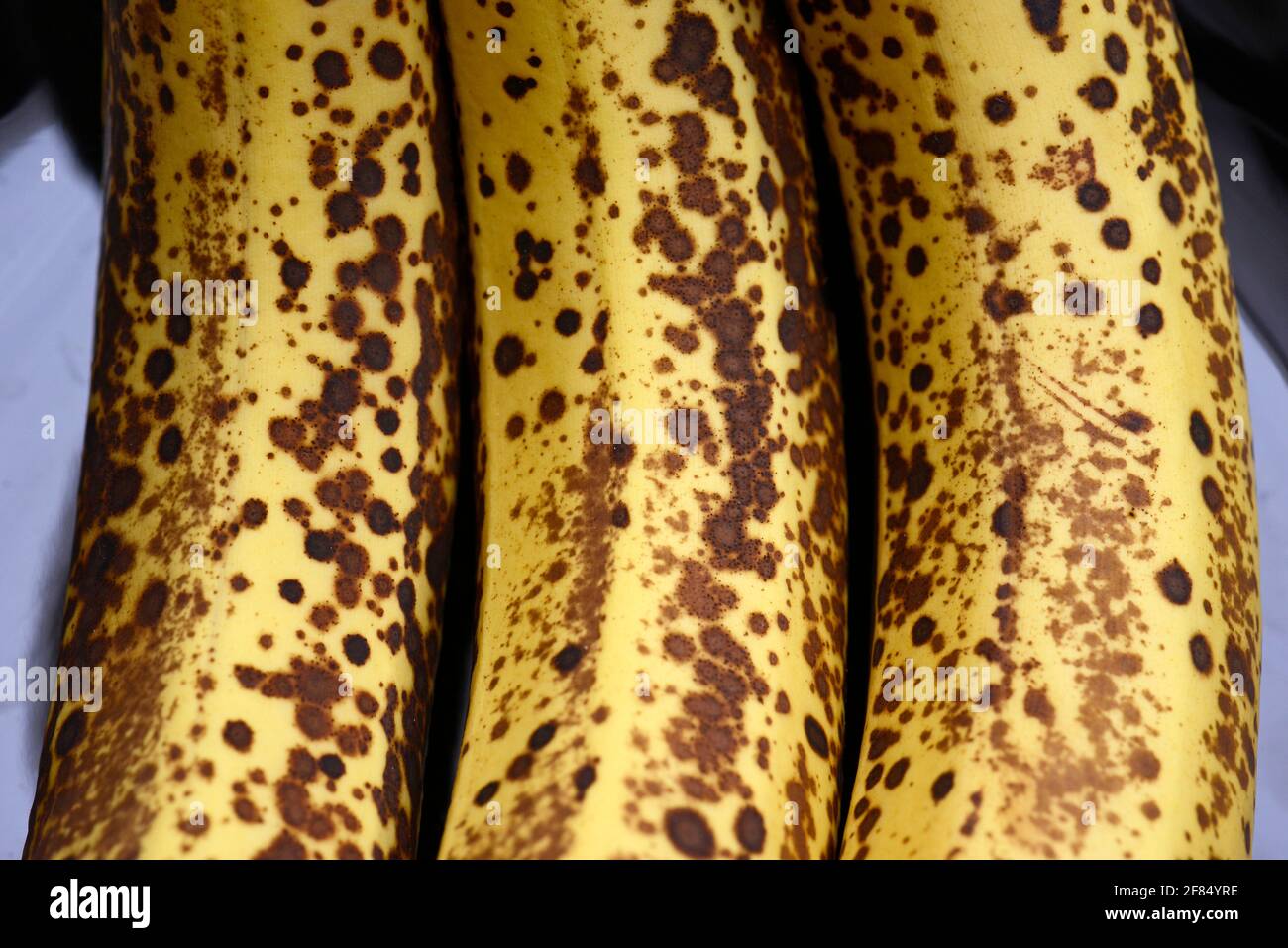 Three spotty bananas on a plate in Beijing, China Stock Photo - Alamy