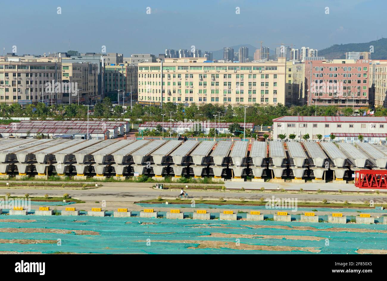 View of western Shenzhen from the airport metro line with precast ...
