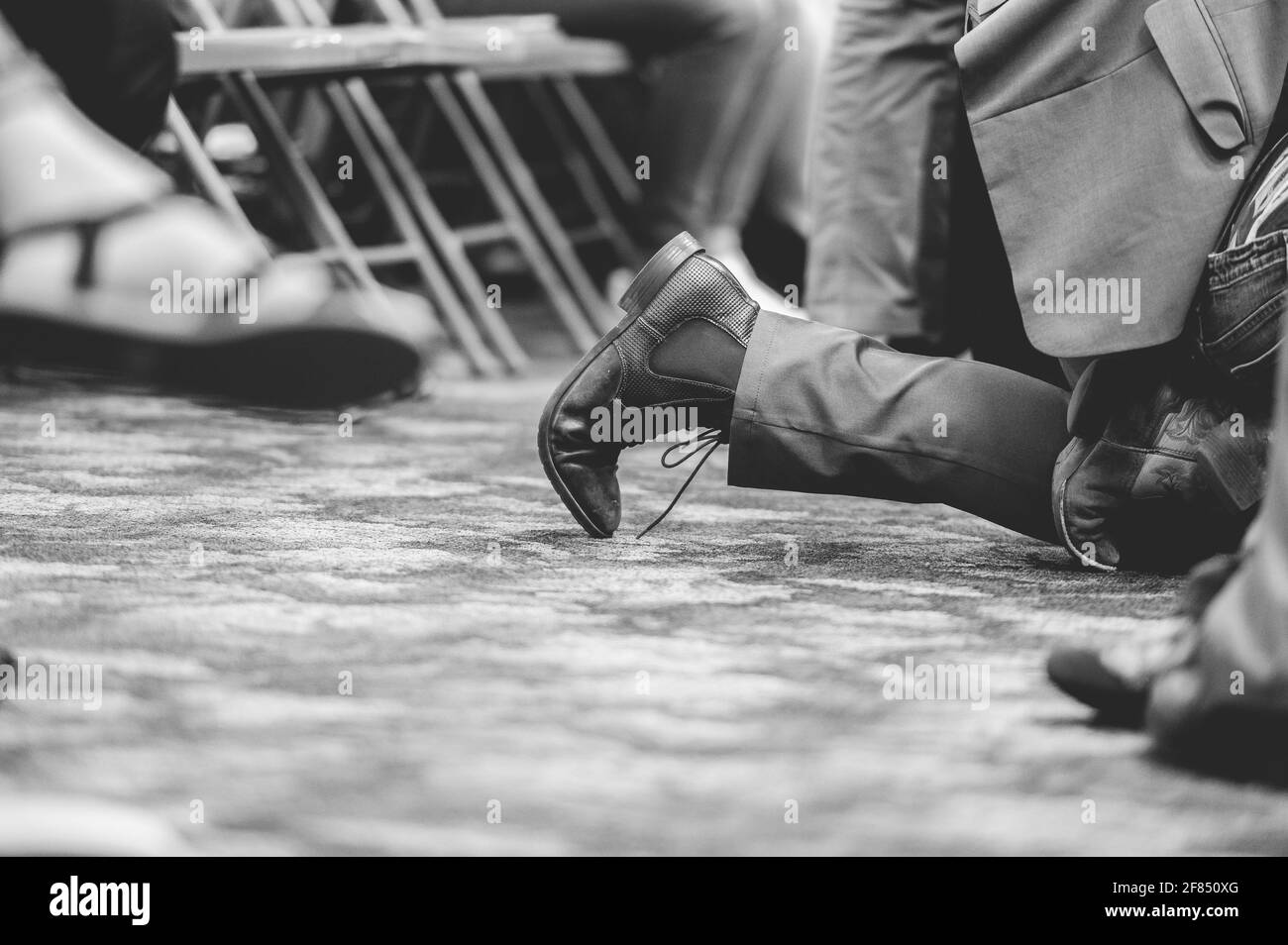Black Man In Suit Praying