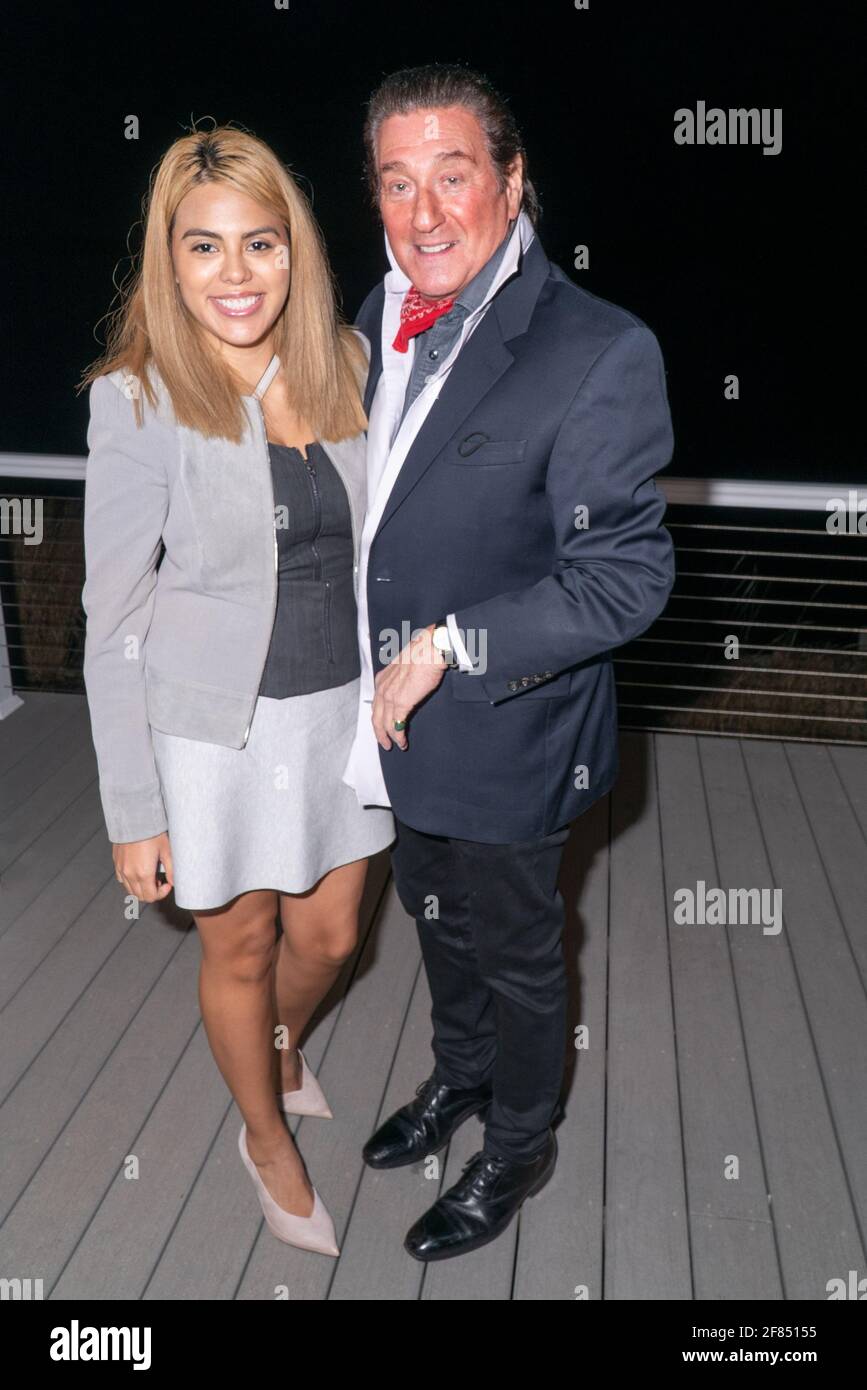 Elize Izzy Andez and Irwin Mensch attend Artist Luciana Pampalone Vax ...