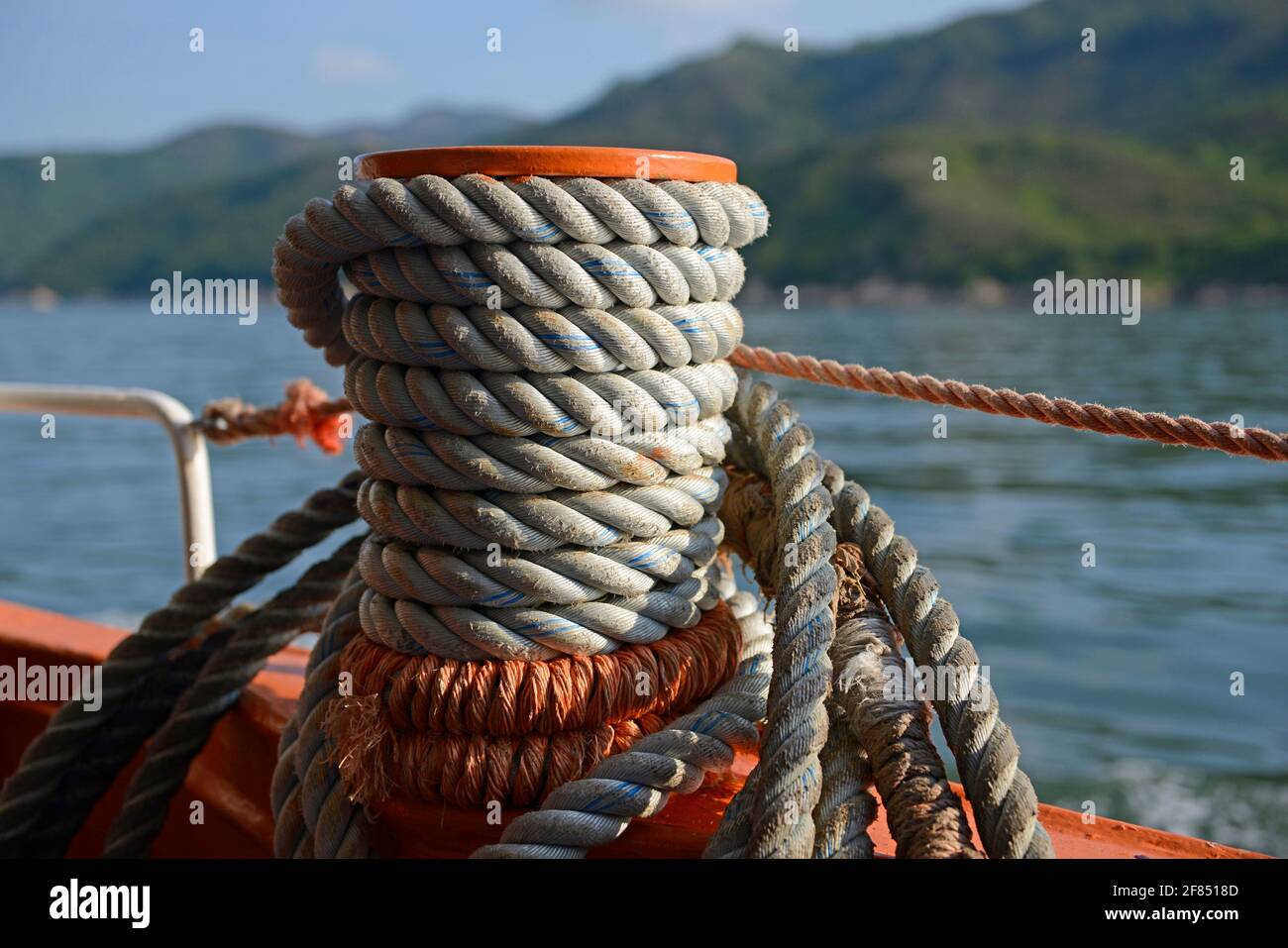 A bollard tightly wrapped with rope on a ferry from Central to ...