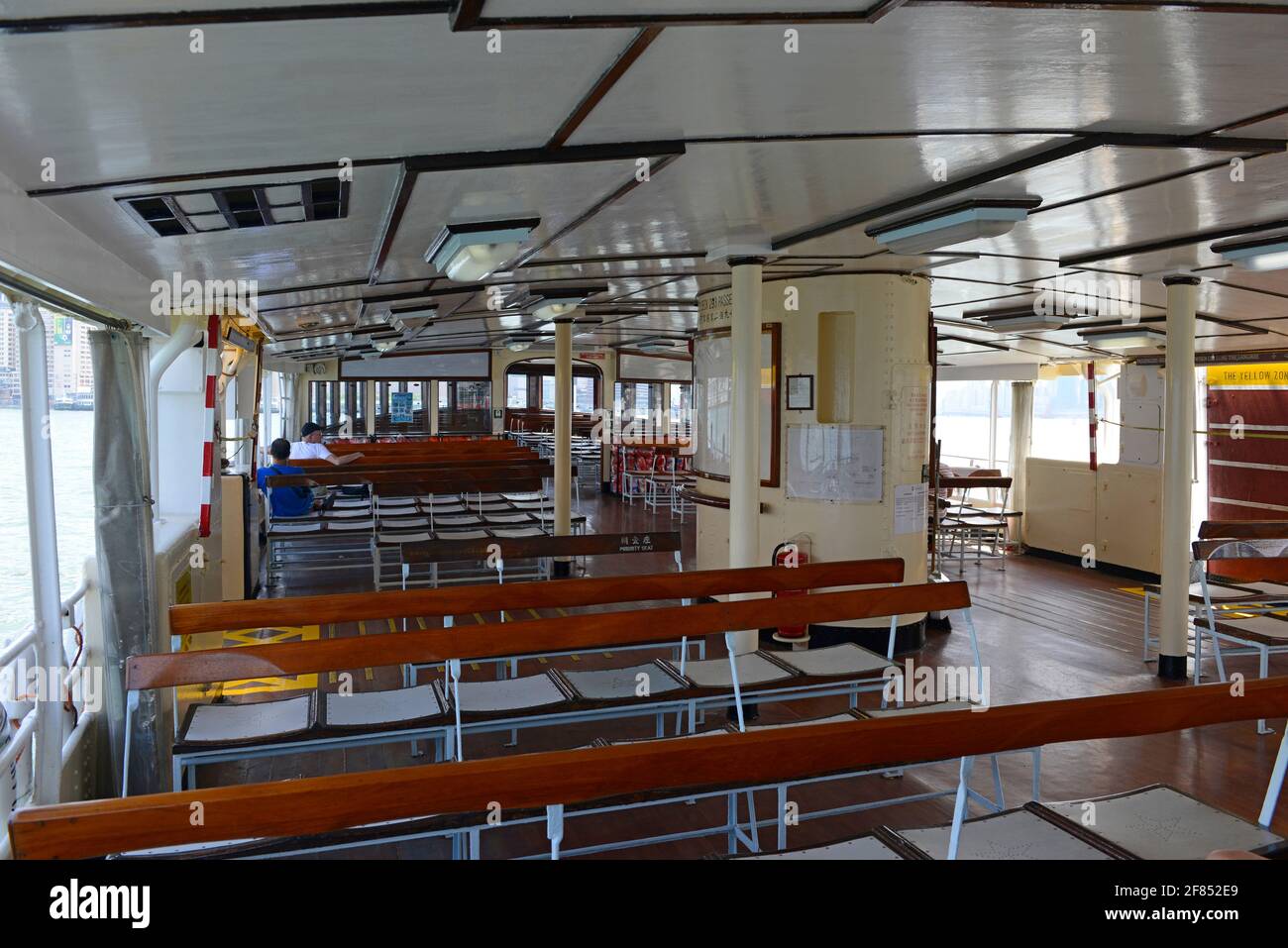View of the upper deck on a Star Ferry travelling across the harbour in ...