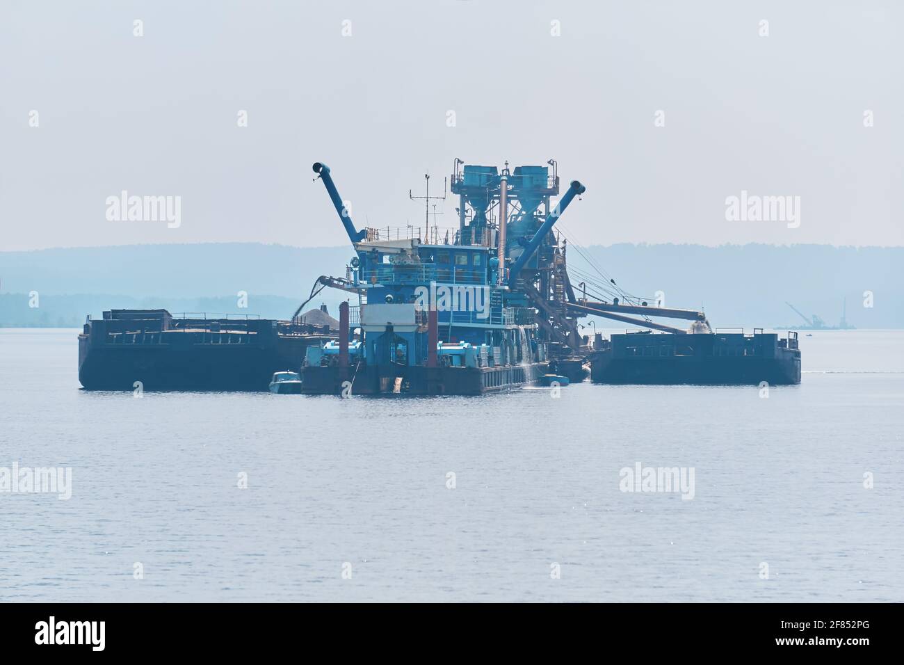 floating sand mining plant - dredger and separator - working on the ...