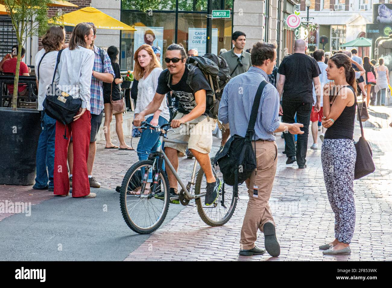 Seated woman with bicycle hi-res stock photography and images - Alamy