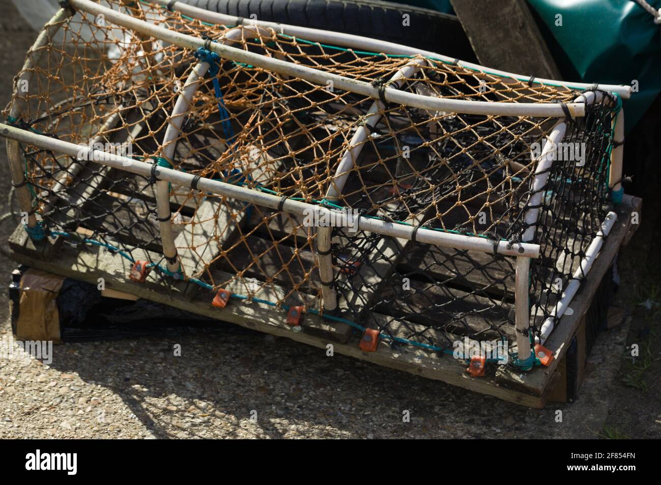 Netted cage / creel-shaped lobster / crab pot Stock Photo - Alamy