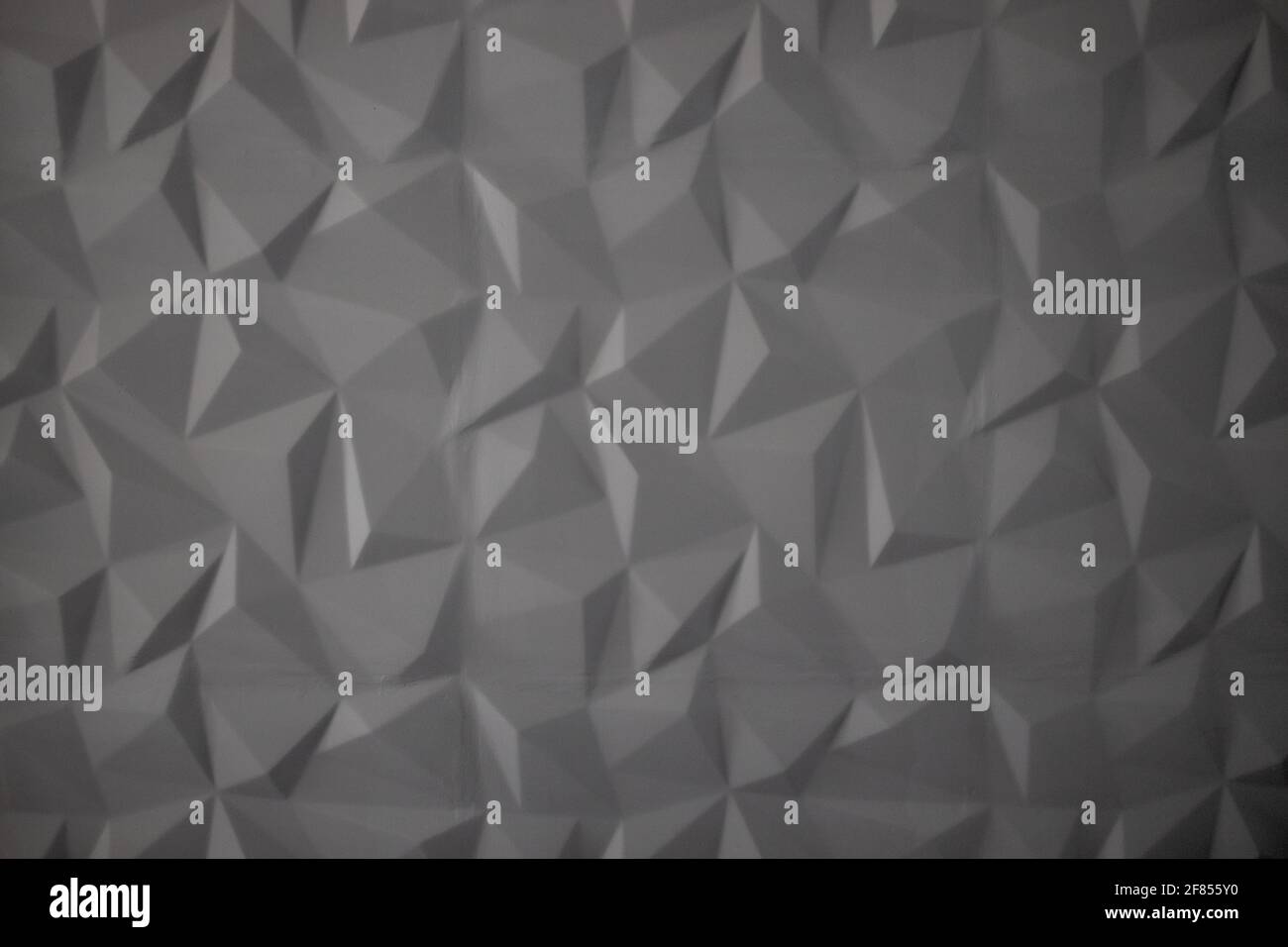 Abstract background of polygons on grey background Stock Photo - Alamy