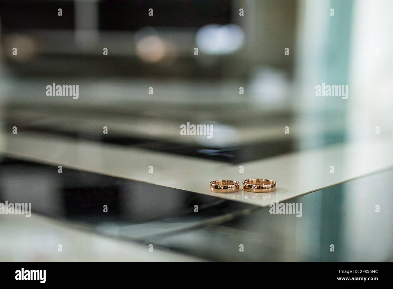 Wedding rings - love story Stock Photo - Alamy