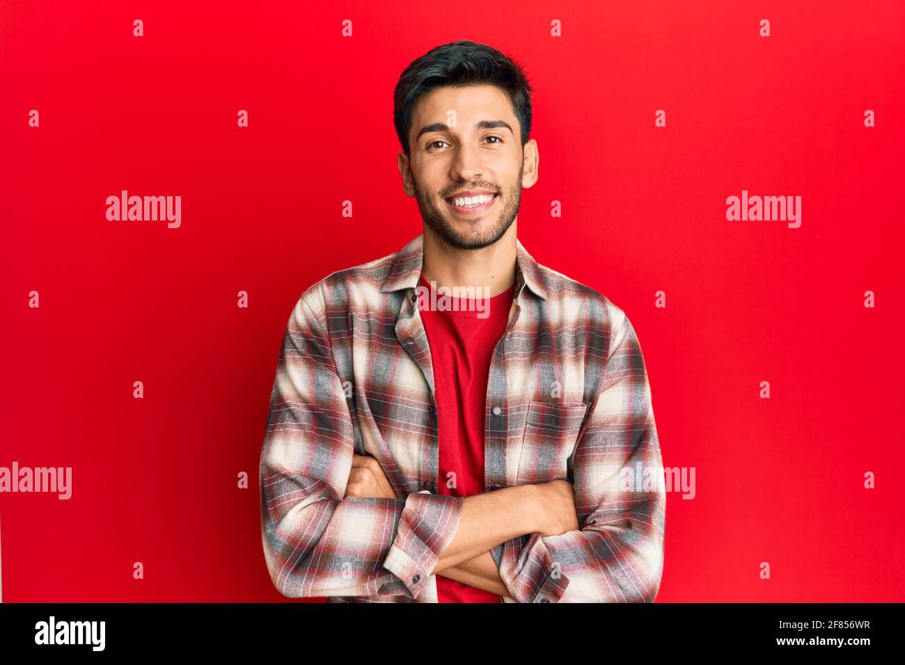 Young handsome man wearing casual clothes happy face smiling with ...