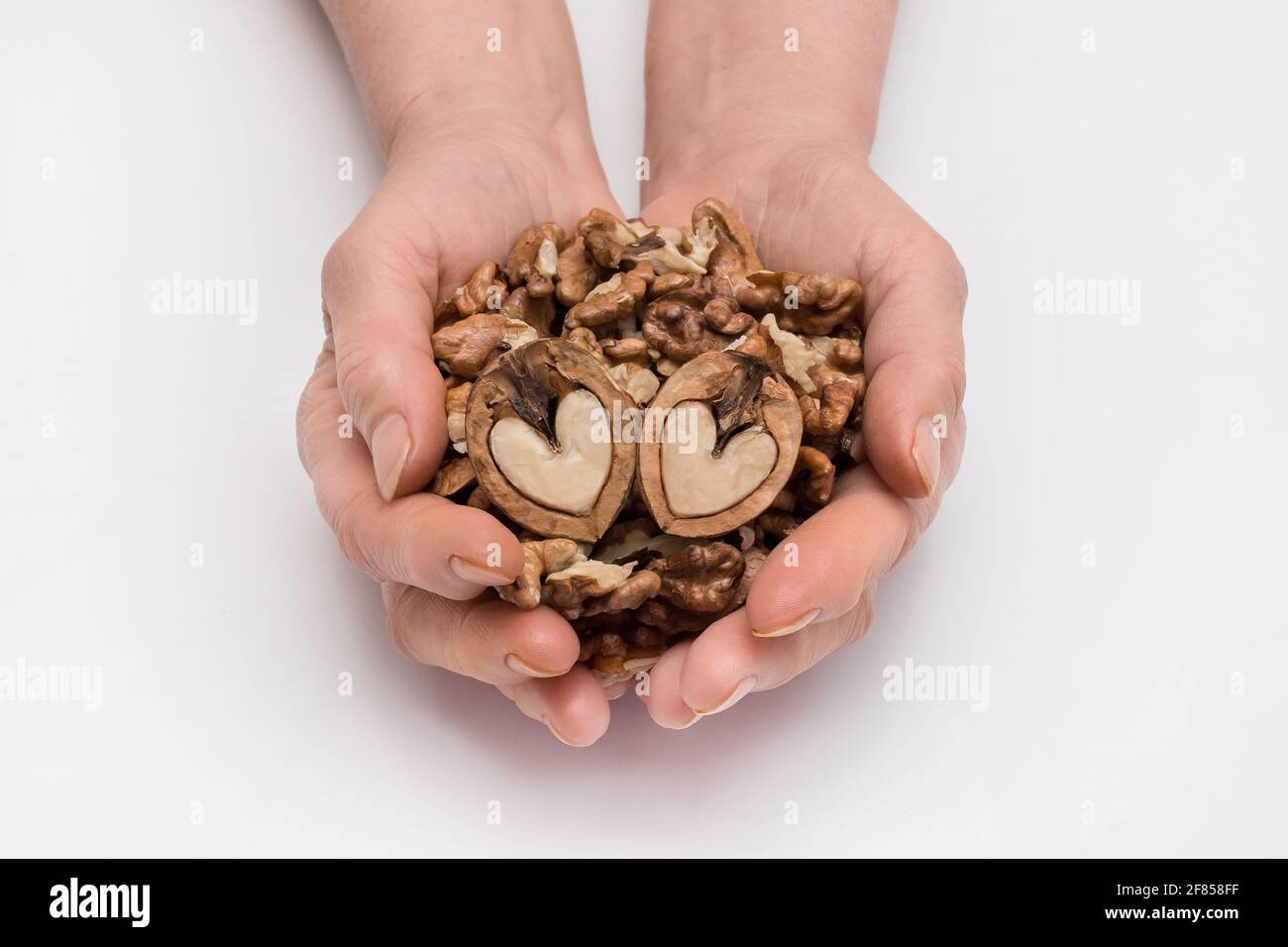 Woman and nuts hi-res stock photography and images - Alamy