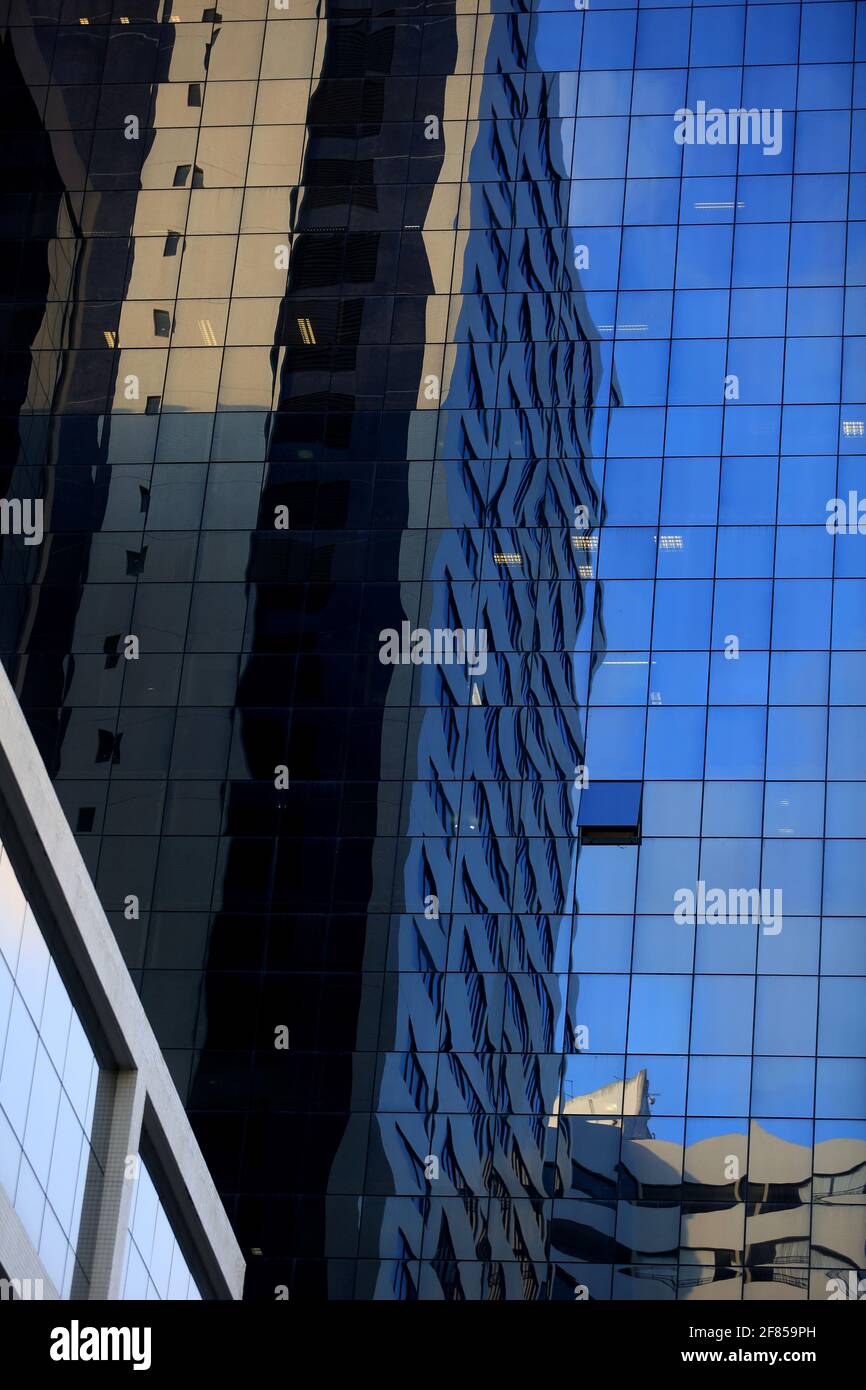 Reflections in mirrored facade in a modern building hi-res stock ...