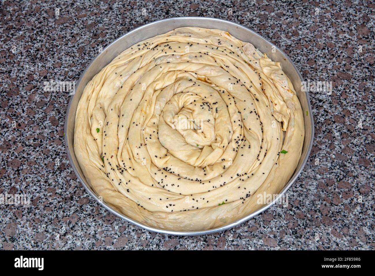Bosnian borek. Homemade rolled borek, spinach, potato and feta cheese ...
