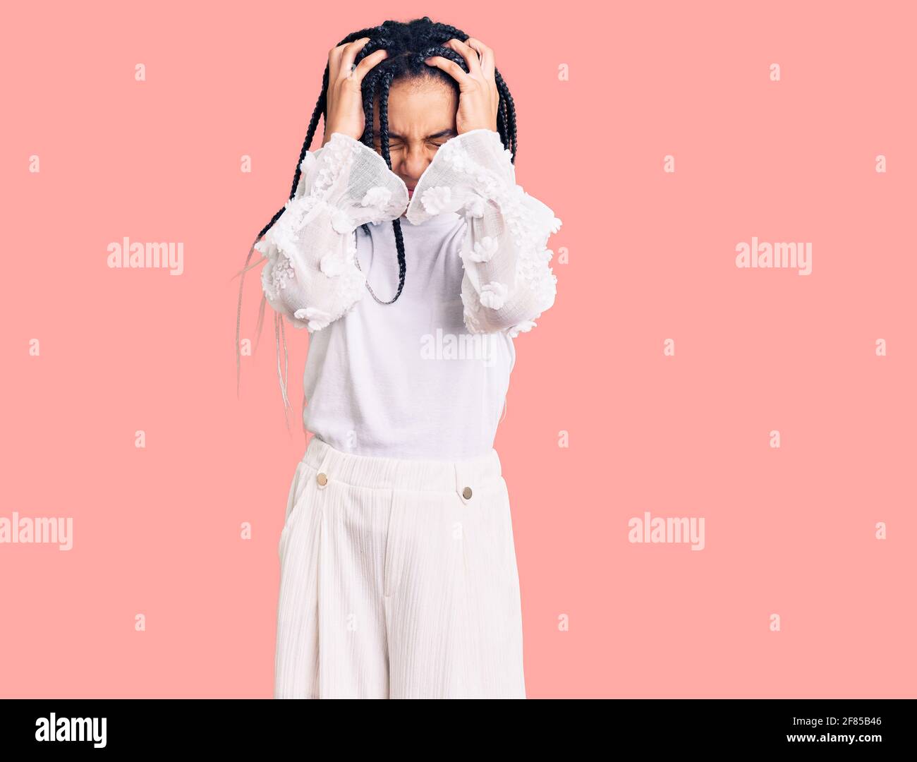 Cute african american girl wearing casual white tshirt suffering from ...