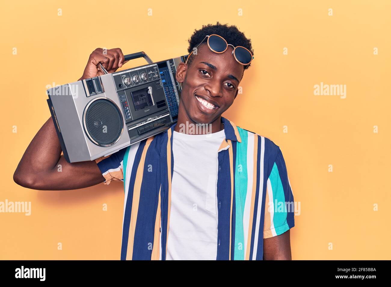 Man Holding Boombox