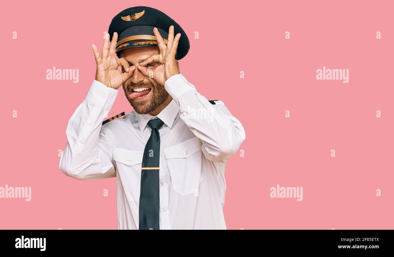 Captain looking through binoculars hi-res stock photography and images ...