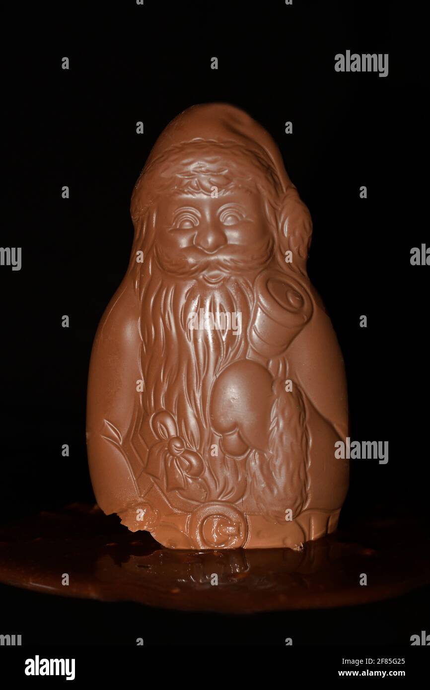 Melting chocolate Santa Claus Stock Photo - Alamy