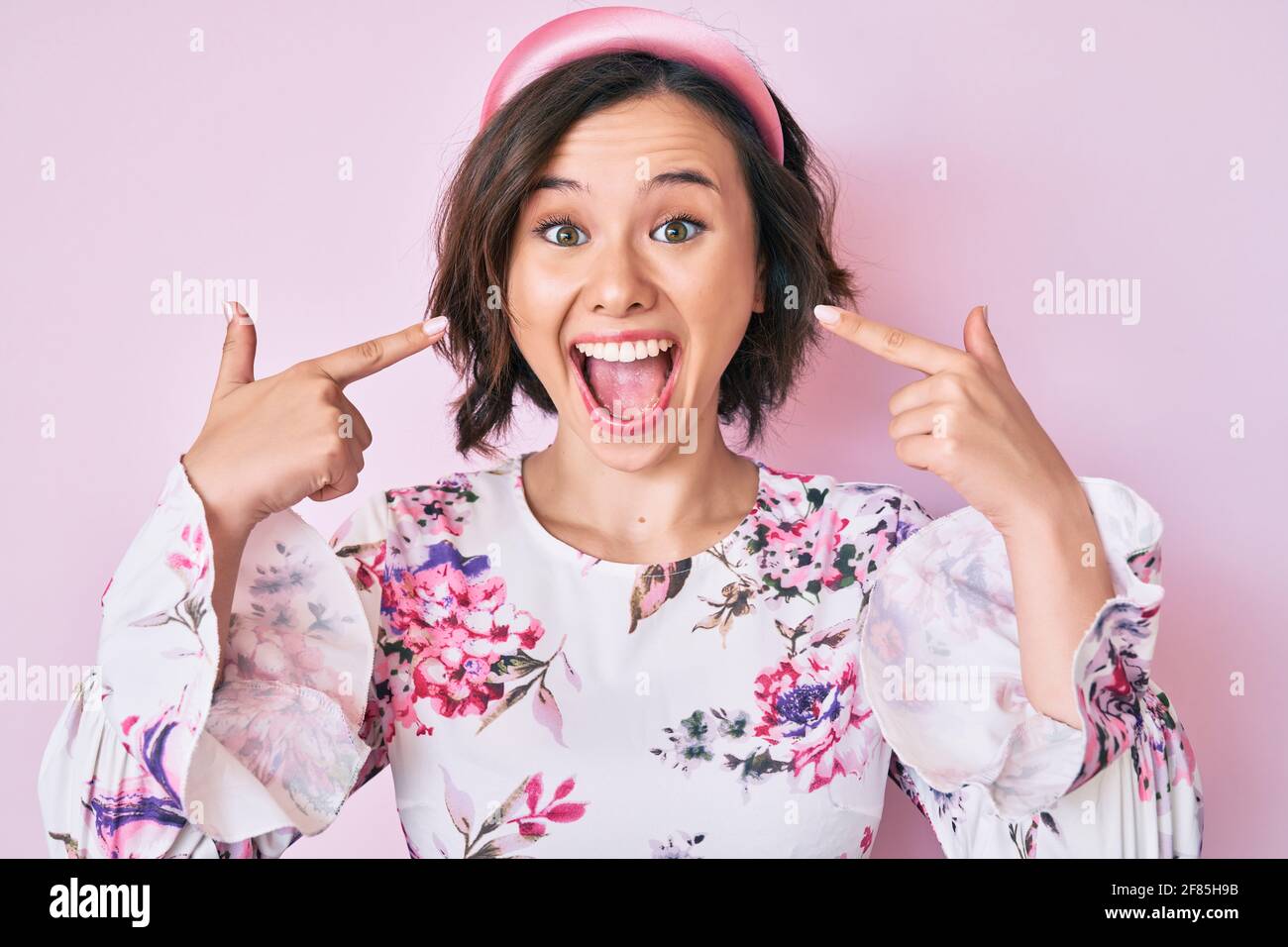 Young beautiful woman pointing with fingers to herself celebrating ...